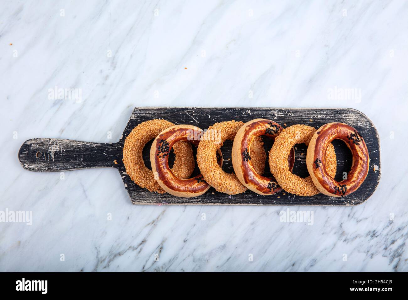 Turkish Bagel Kandil simiti with tea (stack of pastry). A savory, ring ...