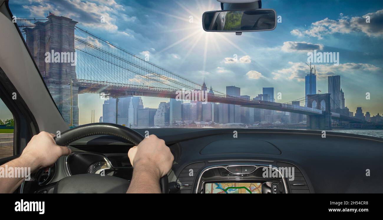 Driving a car towards the iconic Brooklyn Bridge, one of the major ...