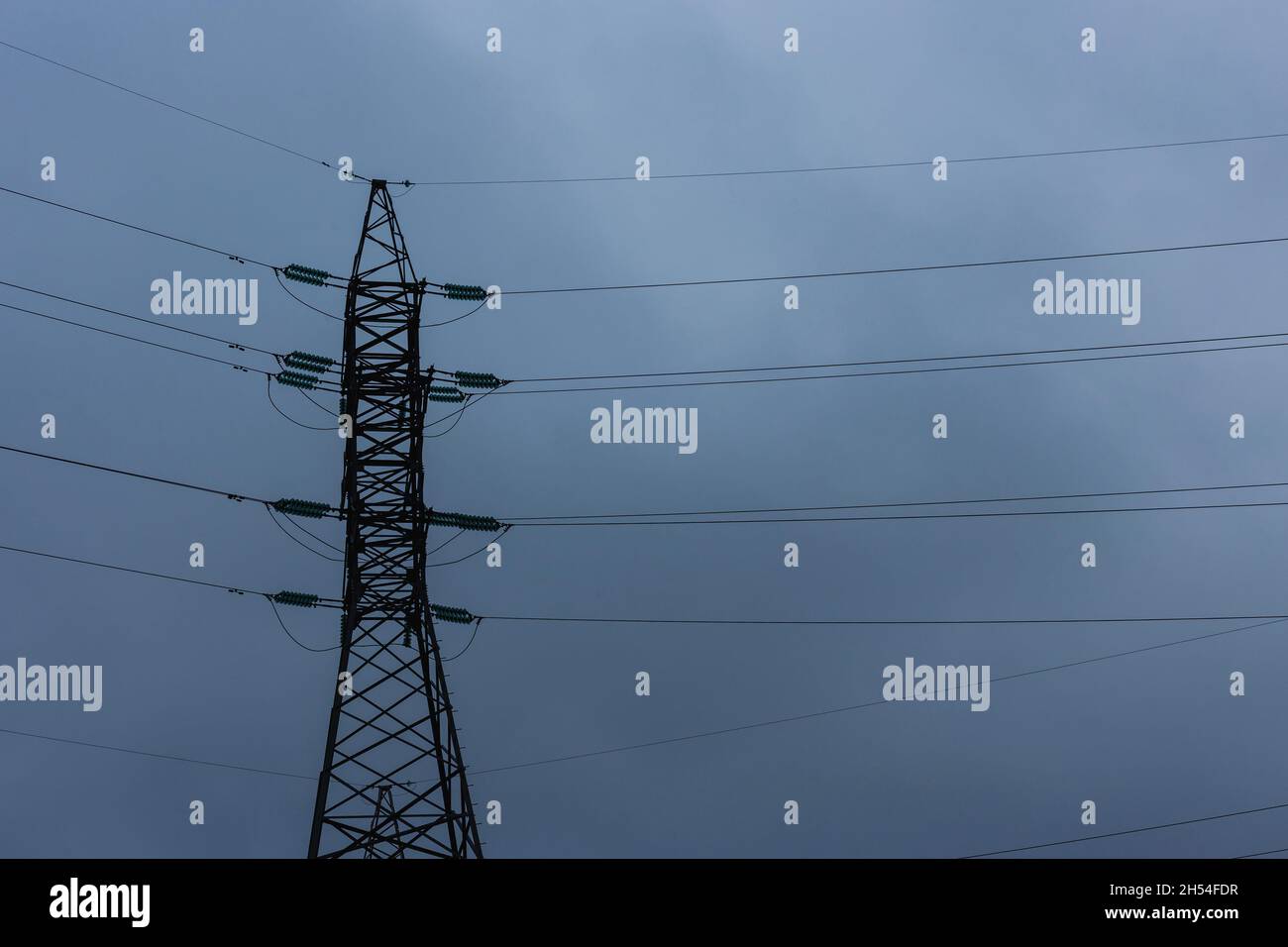 Power lines on the background of the cloudy sky Stock Photo - Alamy