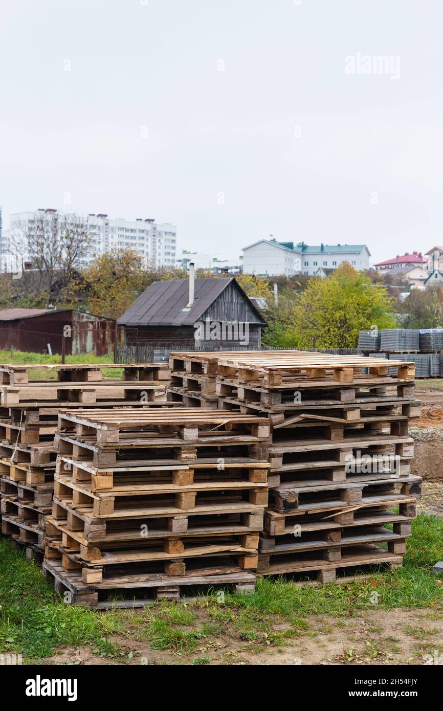 Wooden pallets for transporting building materials on a construction ...
