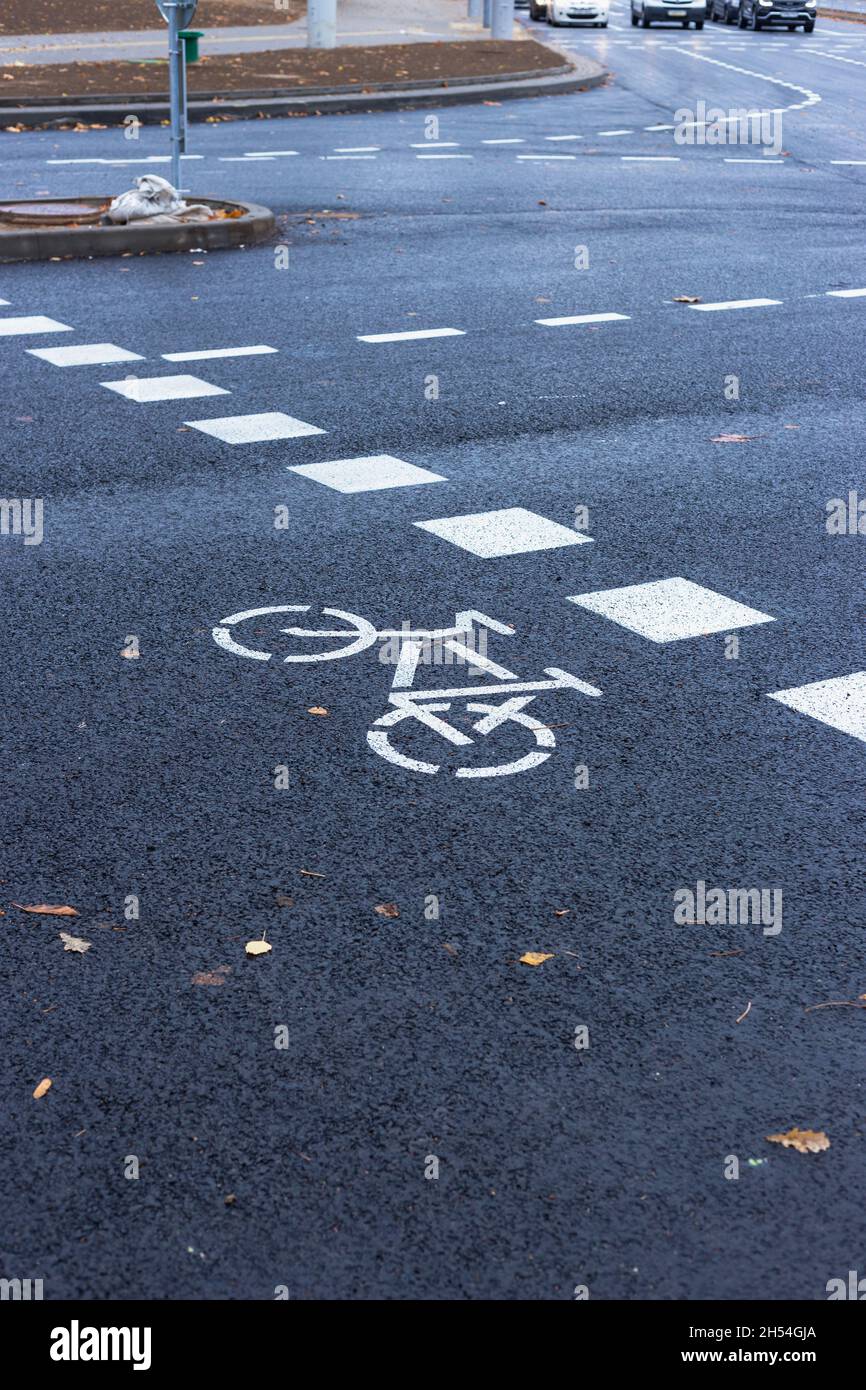 Bicycle path passing through the pedestrian crossing Stock Photo - Alamy