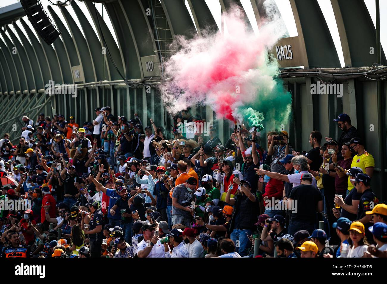 The crowd of fans in the grandstands of the stadium during the Formula ...