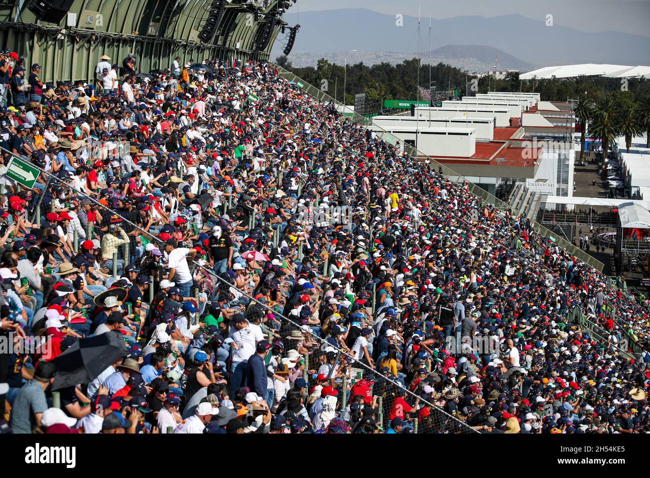The crowd of fans in the grandstands of the stadium during the Formula ...
