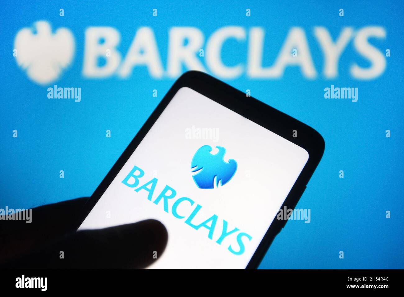 In this photo illustration a Barclays plc logo is seen on a smartphone ...