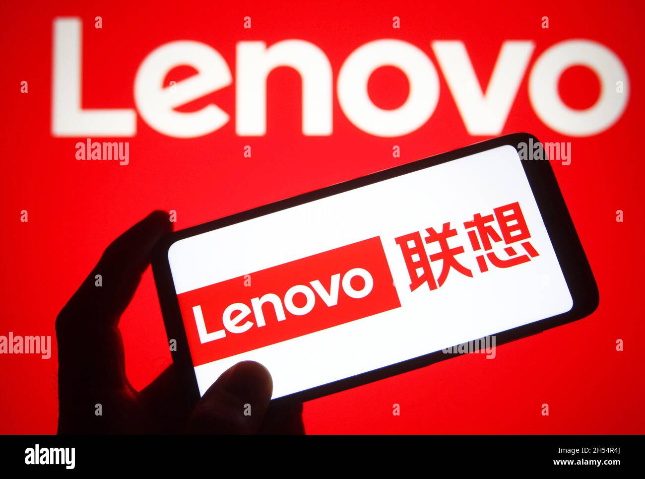 In this photo illustration, a Lenovo Group Limited logo is seen on a ...