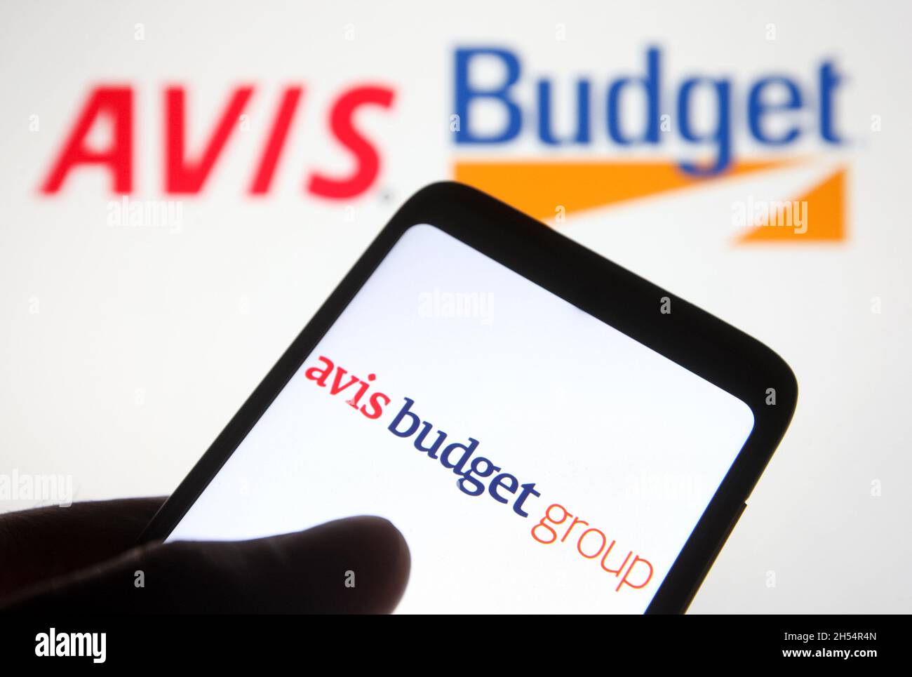 In this photo illustration, an Avis Budget Group, Inc. logo is seen on ...