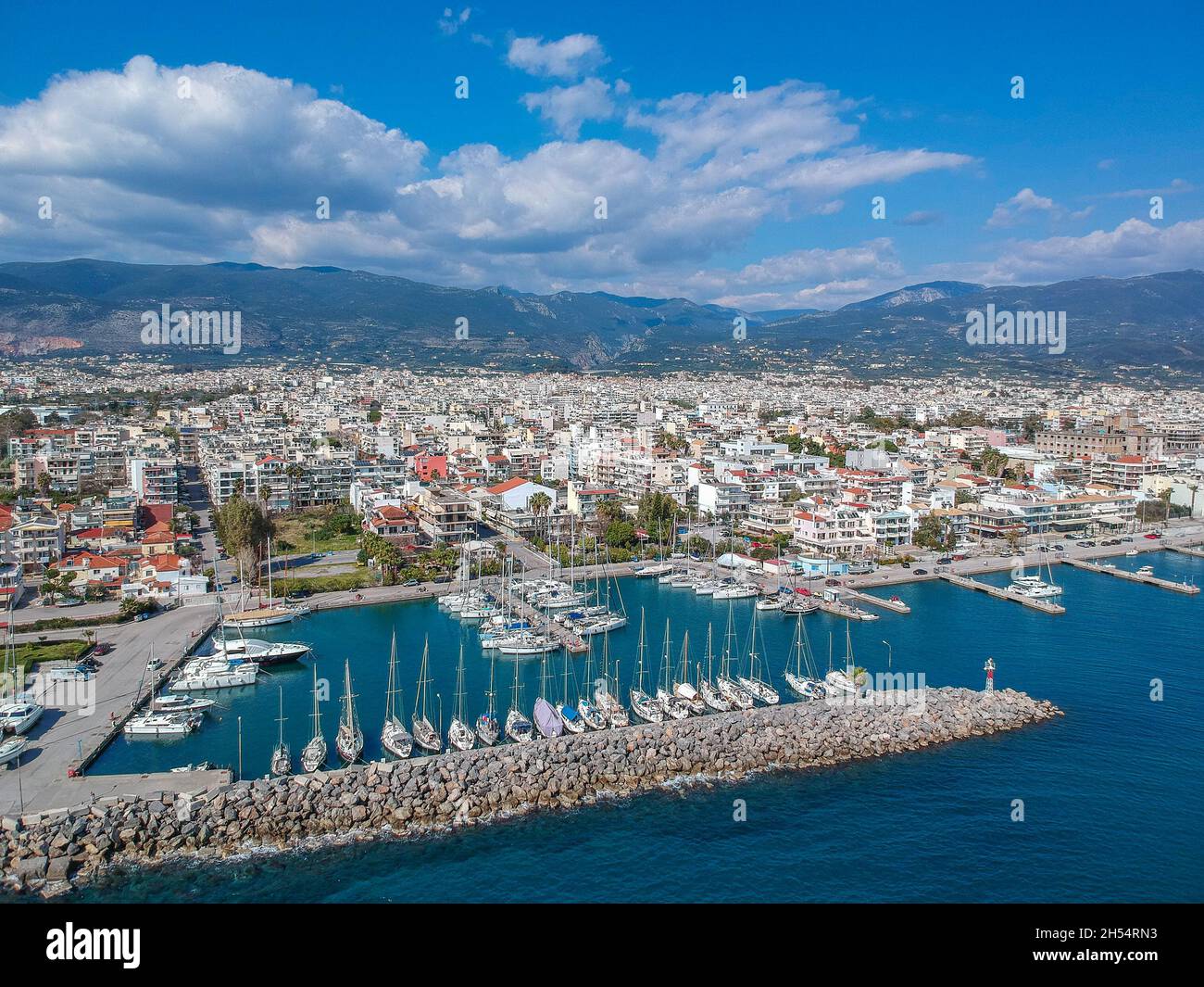 Idyllic landscape flying above Kalamata's Marina at sunset. Aerial ...