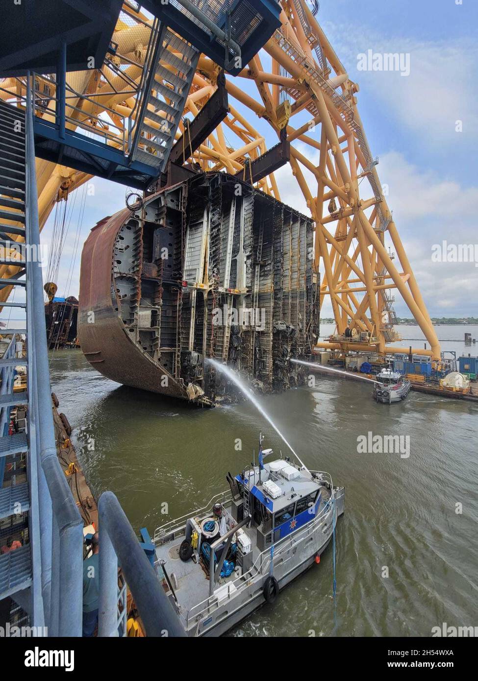 Utility tugs use seawater to flush sediment and reduce the weight of ...