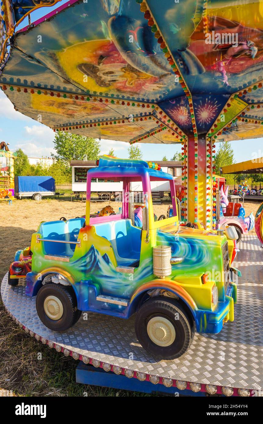 POZNAN, POLAND - May 20, 2016: A colorful carousel attraction with ...