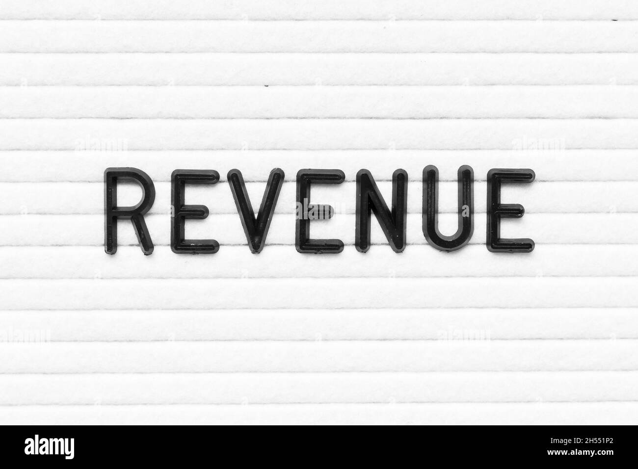 Black letter in word revenue on white felt board background Stock Photo ...