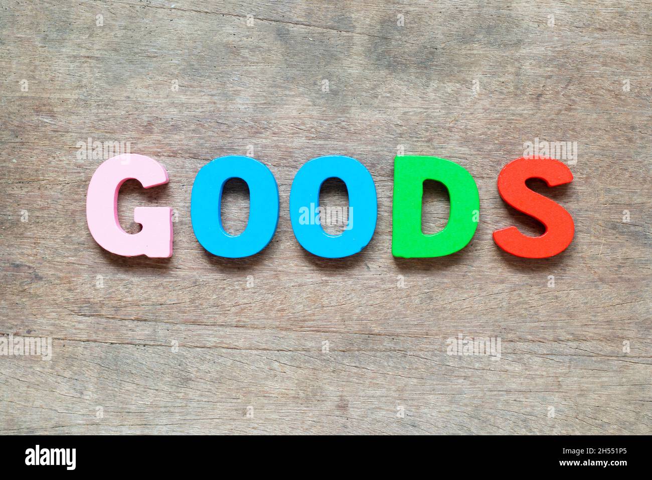 Color alphabet letter with word goods on wood background Stock Photo ...