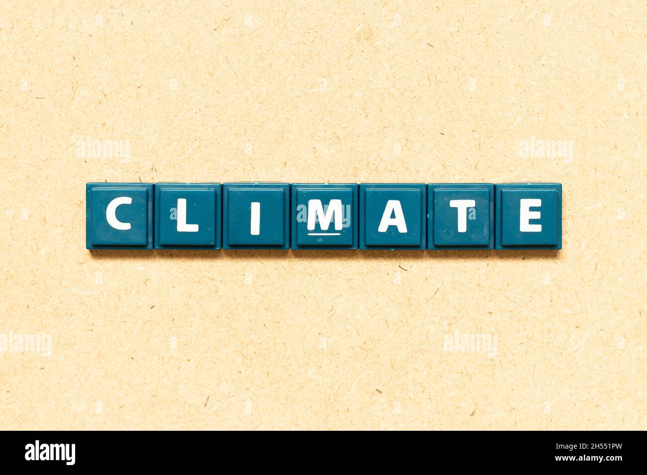 Tile alphabet letter in word climate on wood background Stock Photo - Alamy
