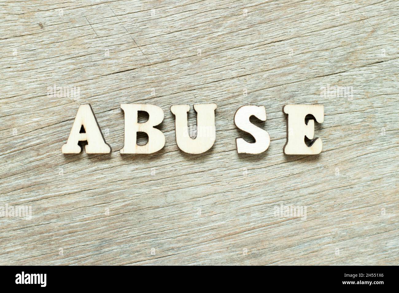 Alphabet letter in word abuse on wood background Stock Photo - Alamy