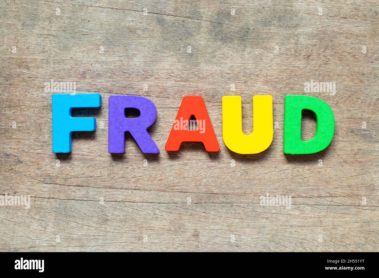 Color alphabet letter with word fraud on wood background Stock Photo ...