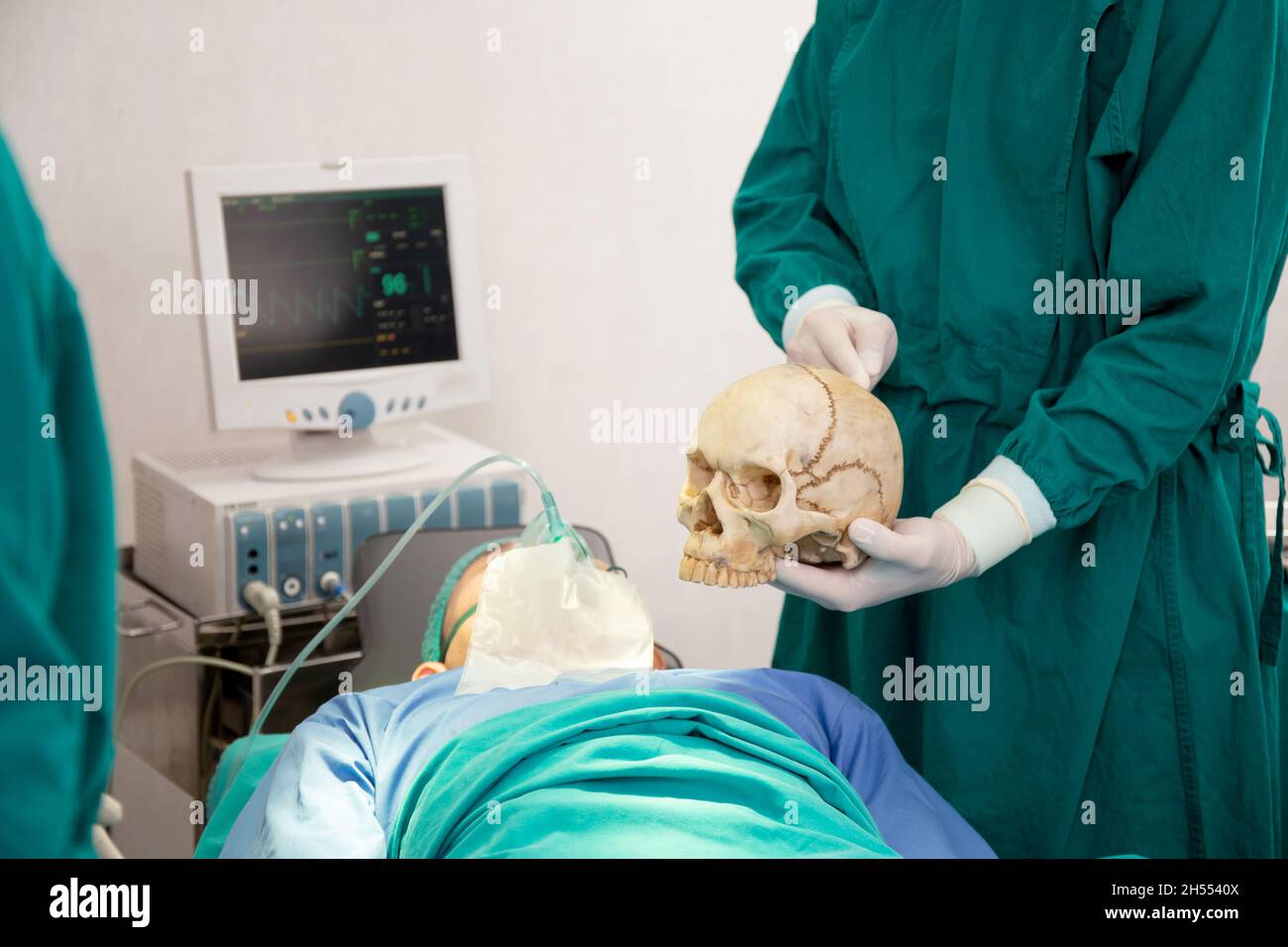 Team of doctor and surgeon explain about surgery skull and brain with ...