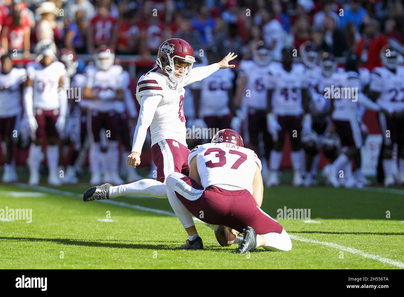 November 6, 2021: Bulldog place kicker Brandon Ruiz #8 kicks the ball ...