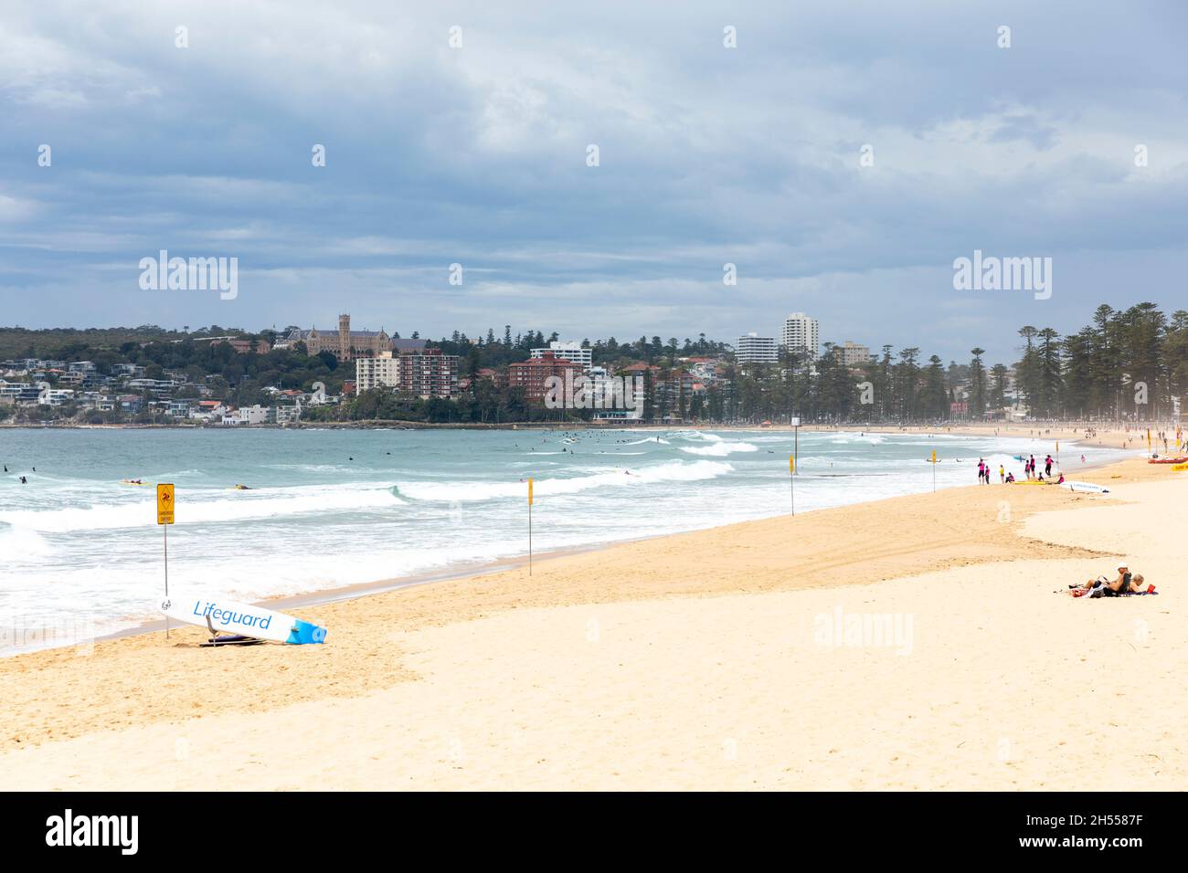 Manly Beach in Sydney view along the sands and ocean with lifeguard ...