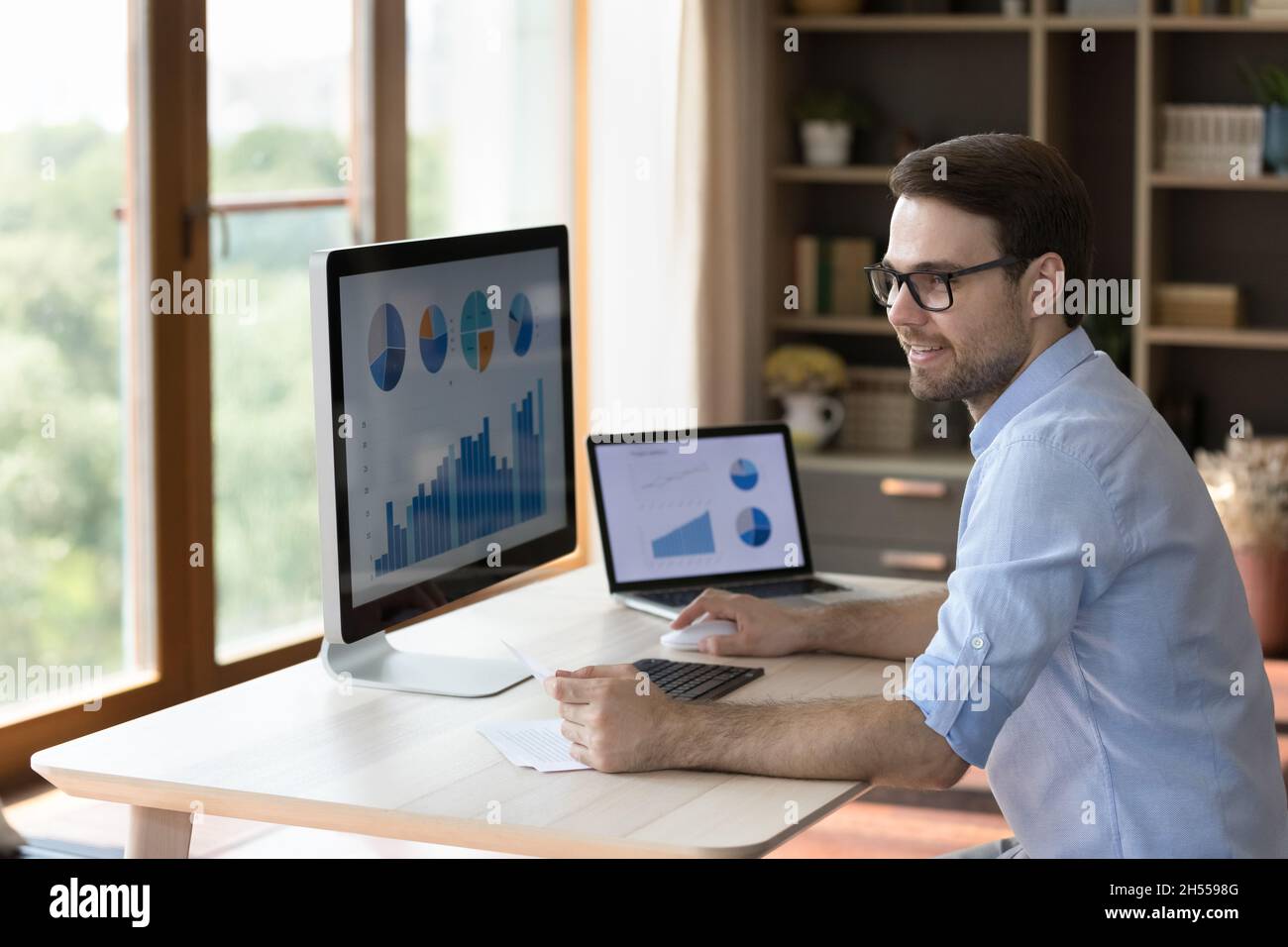Happy young ceo executive manager using modern technology gadgets Stock ...