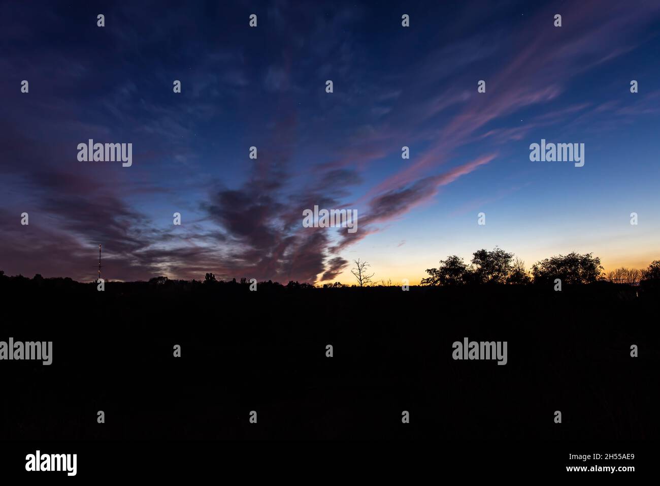 Bright contrasting blue sky with color gradient Stock Photo - Alamy