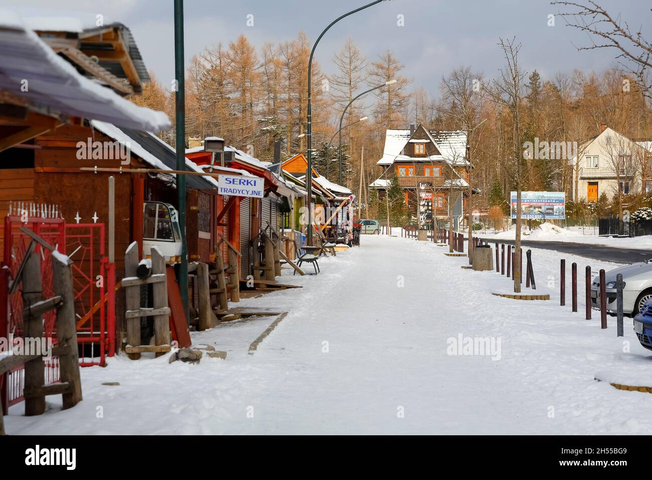 Zakopane, Poland - March 22, 2018: Along the sidewalk there are ...