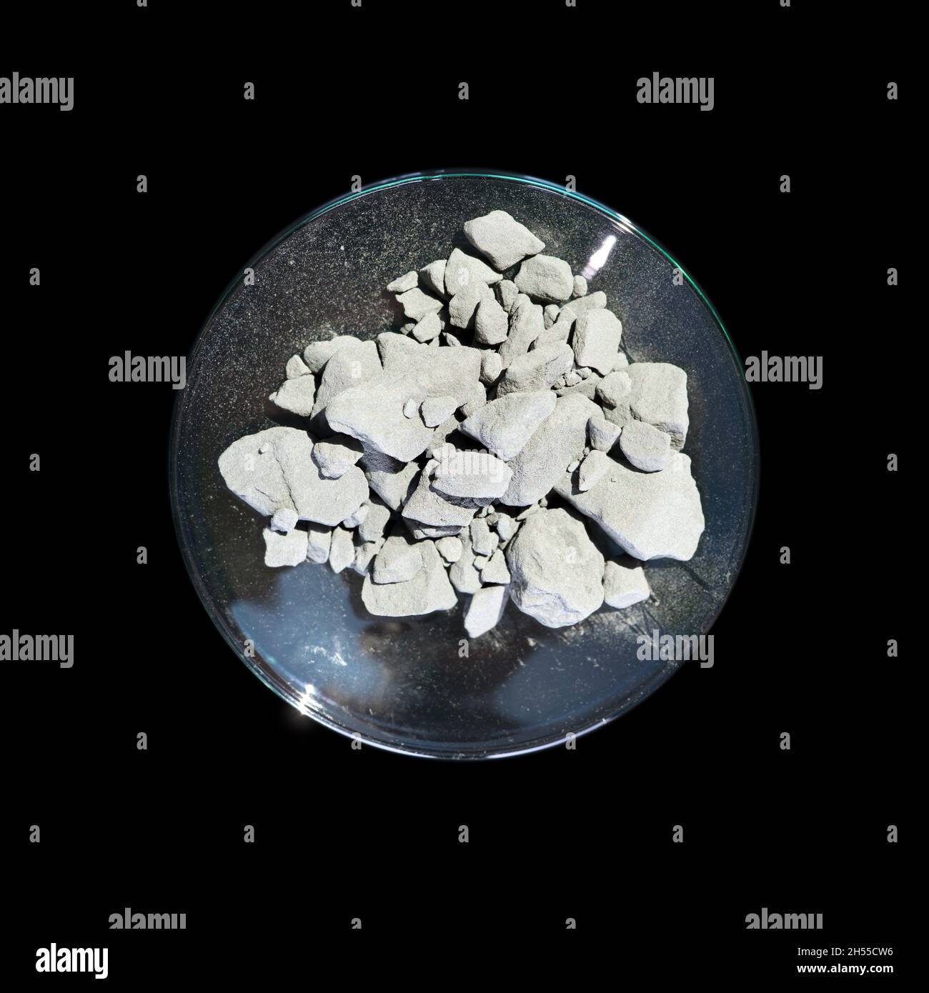 Aluminium powder in Chemical Watch Glass. Close up chemical ingredient ...