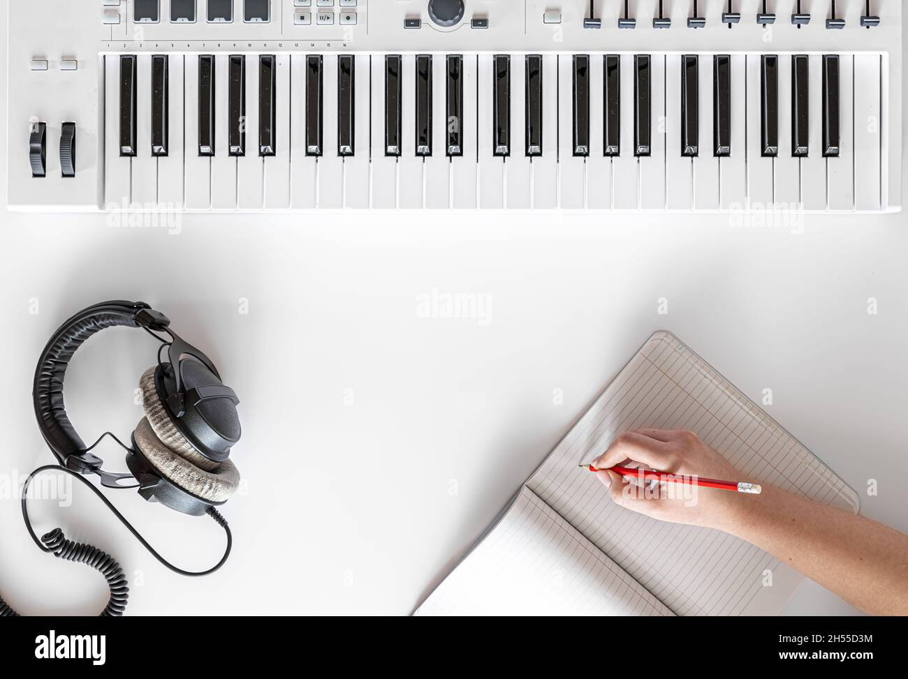 Musical flat lay background with headphones musical keys Stock Photo ...
