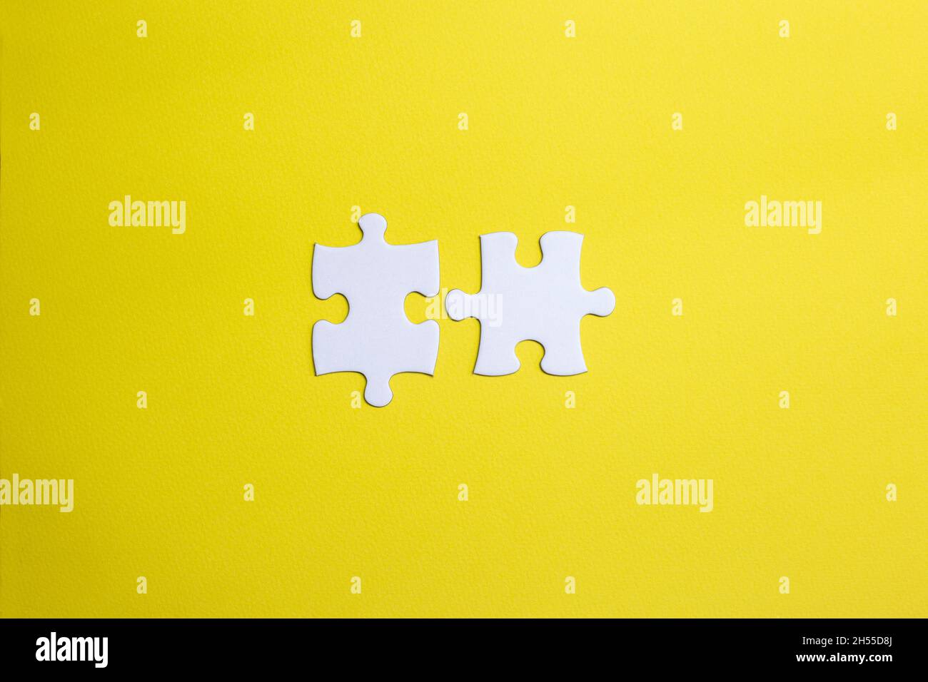 A compatible couple. two pieces of the puzzle about to connect. concept ...