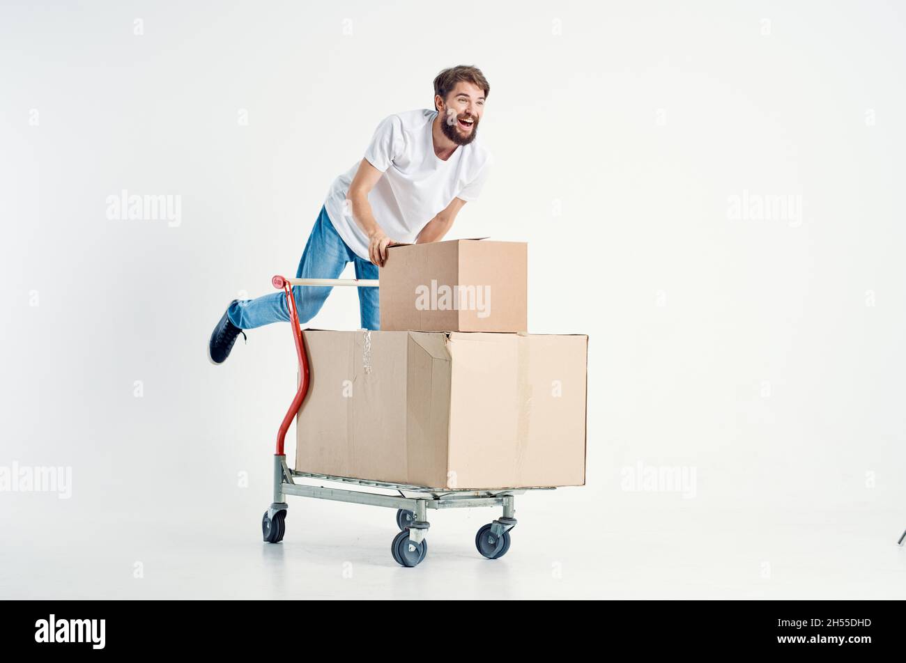 bearded man ride a cart entertainment isolated background Stock Photo ...