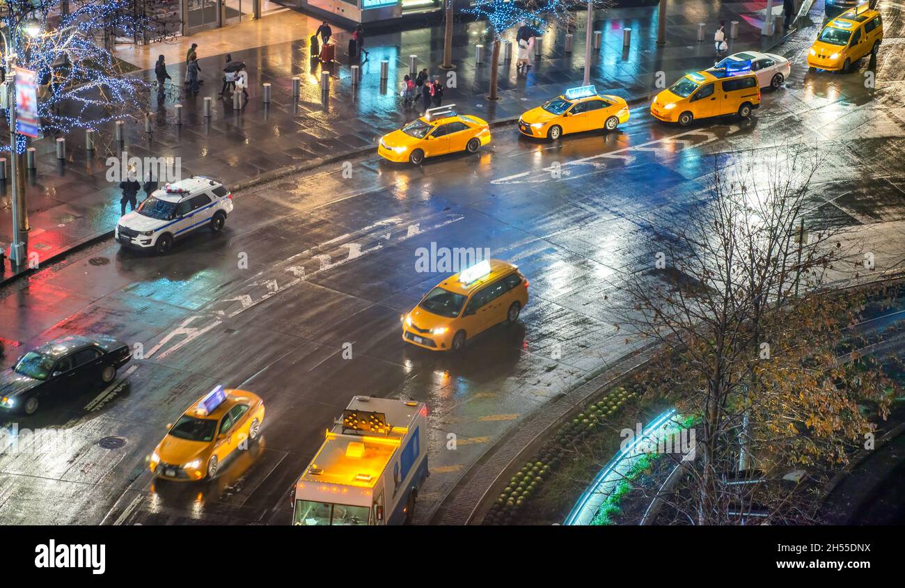 Night traffic along Columbus Circle roundabout in Manhattan, aerial ...