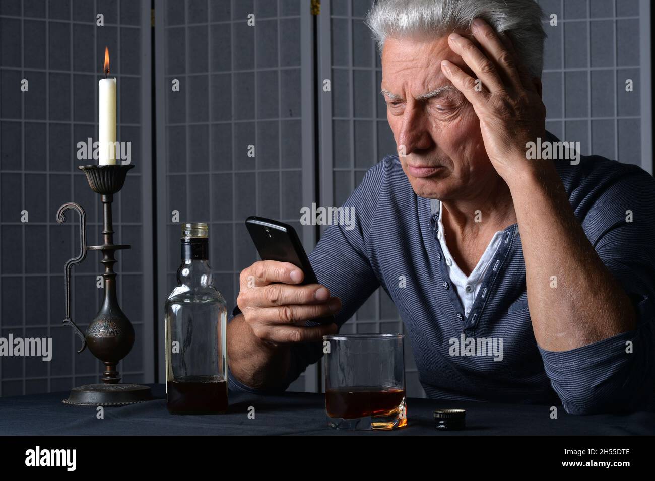 Drunk man sitting table alcohol hi-res stock photography and images - Alamy