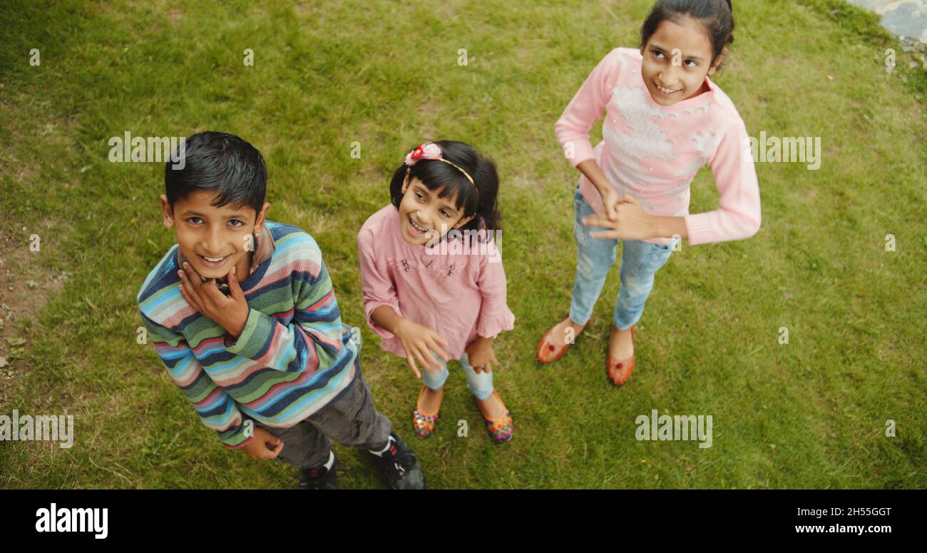 Indian kids playing in a garden hi-res stock photography and images - Alamy