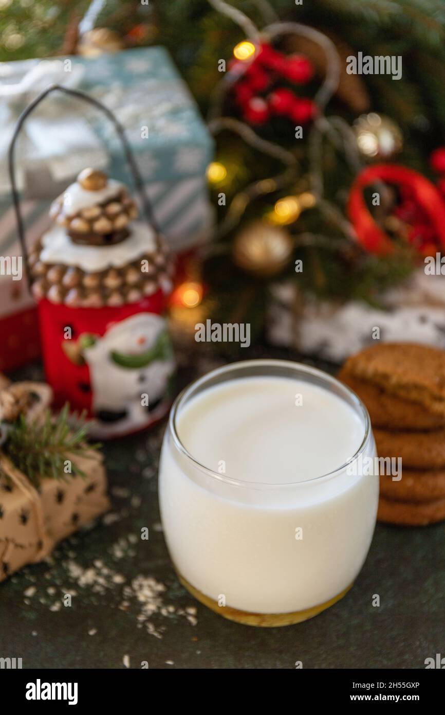 Homemade Cookies and milk for Santa Clause near the Christmas tree with ...