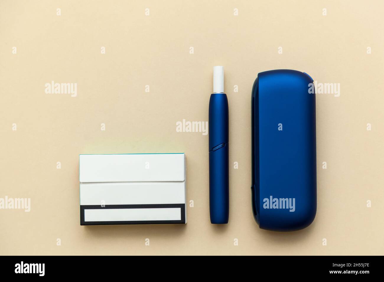 Electronic blue iqos cigarette hi-res stock photography and images - Alamy