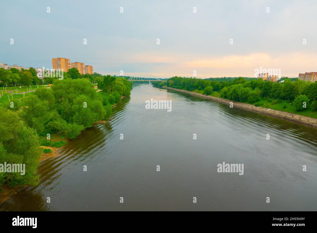 Beautiful panoramic view of a tall pedestrian and water pipe bridge ...