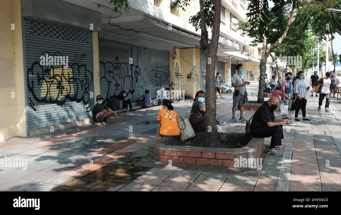 People sitting Thanon Ratchadamnoen Klang in Bangkok Thailand Stock ...