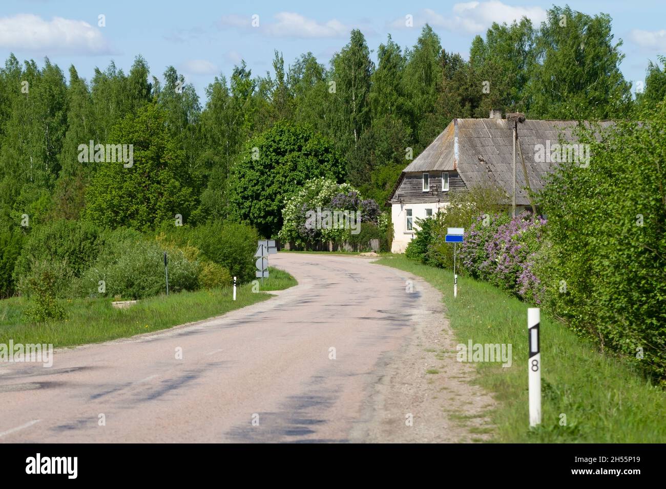 Old detached house at the road Stock Photo - Alamy