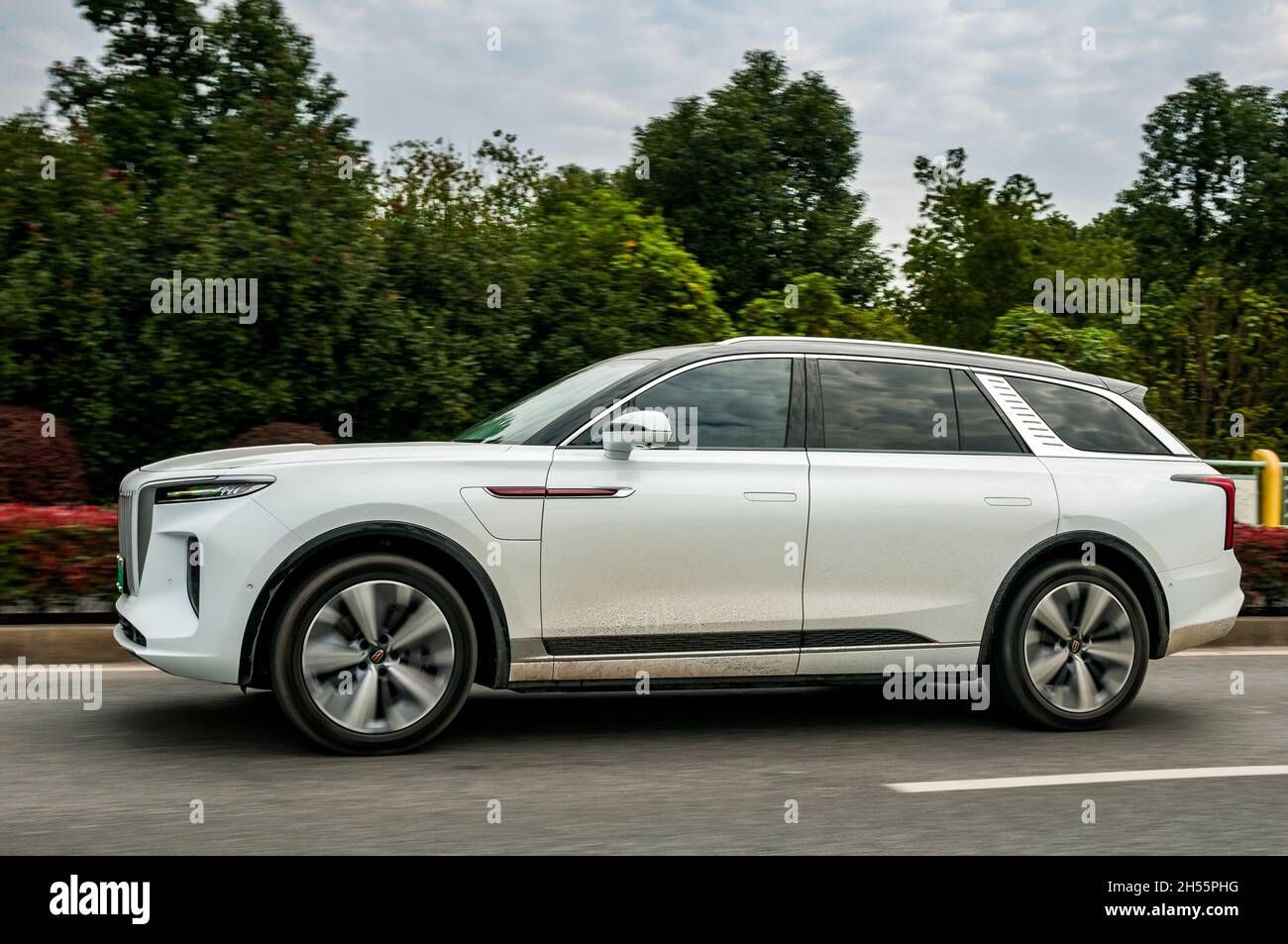An electric Hongqi E-HS9 being driven in Shanghai, China Stock Photo - Alamy