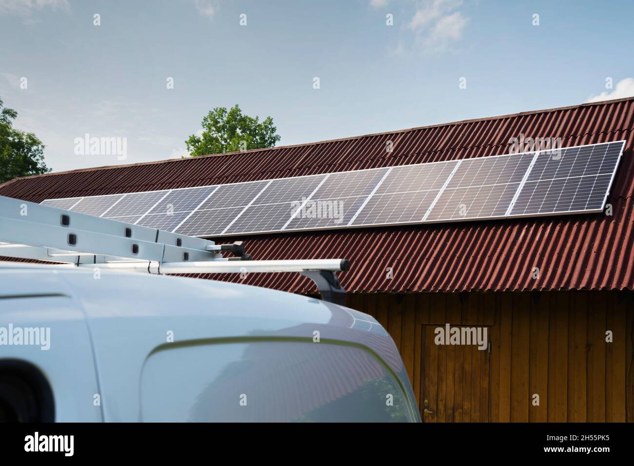 Montage of solar panel on a roof top Stock Photo - Alamy