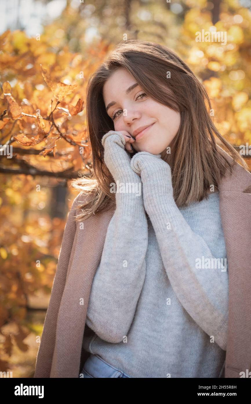 Portrait of a thoughtful and sad girl. Autumn colors . Lifestyle ...