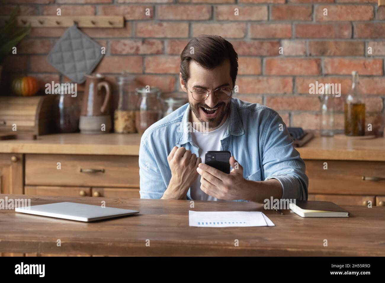 Excited man check email on smartphone receive attractive job offer ...