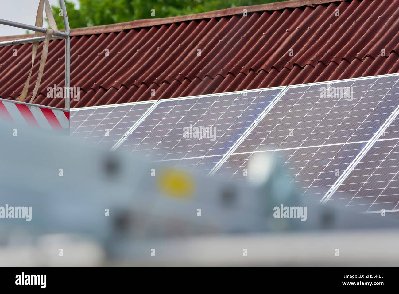Montage of solar panel on a roof top Stock Photo - Alamy