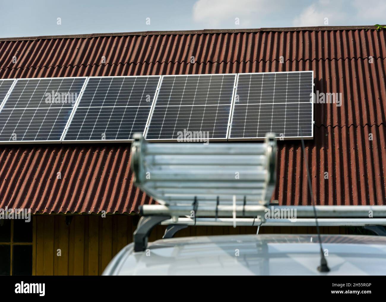 Montage of solar panel on a roof top Stock Photo - Alamy