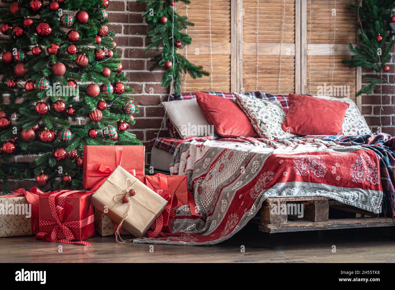 Christmas bedroom interior with red-green colors with a Christmas tree ...