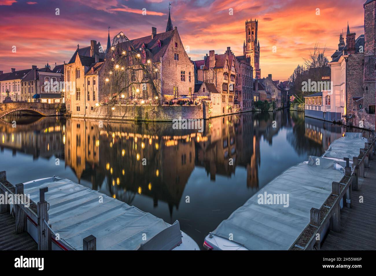 Historic medieval buildings along a canal in Bruges during amazing ...