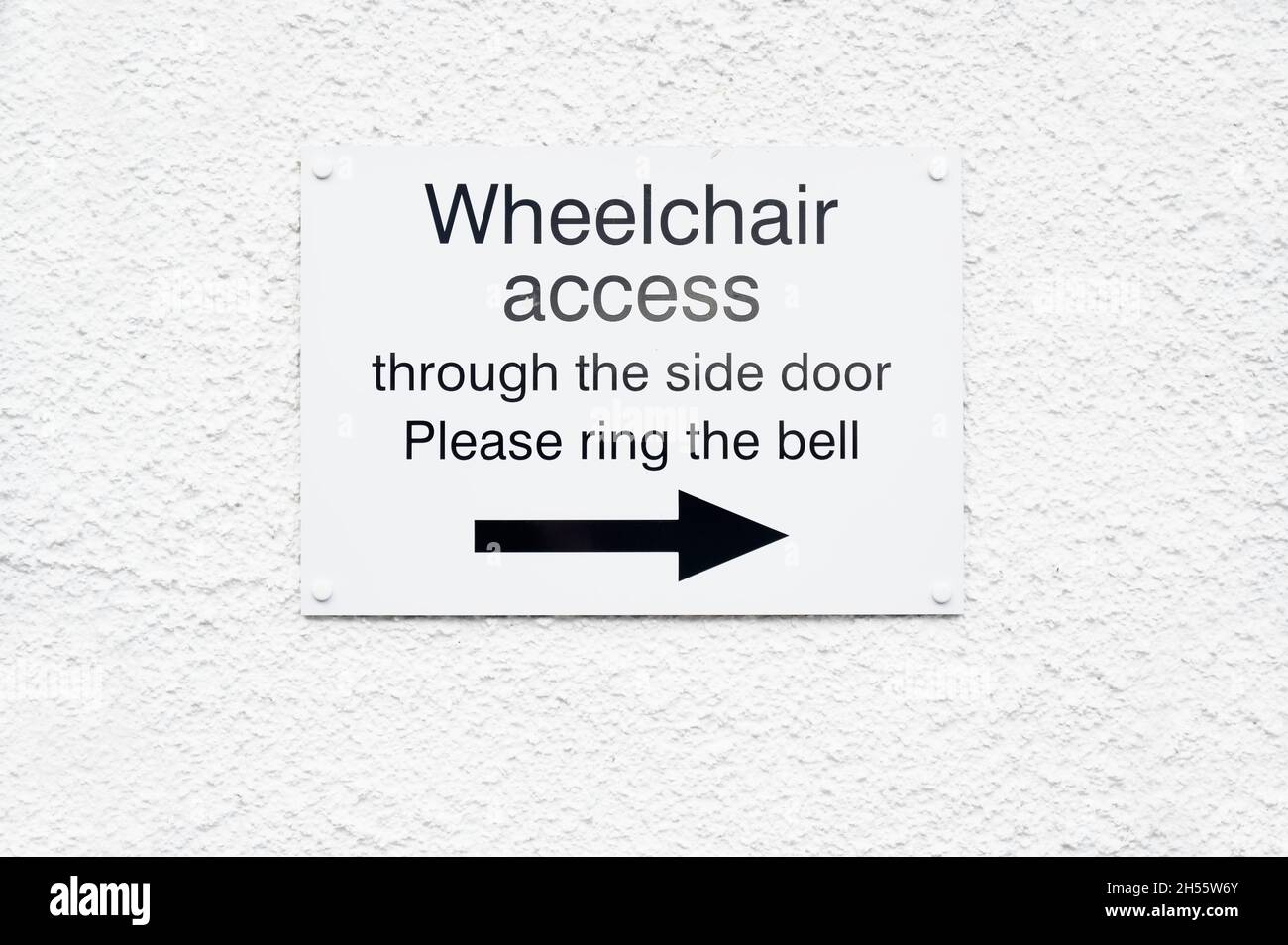 Ramp access for disabled wheelchair users sign at entrance Stock Photo ...