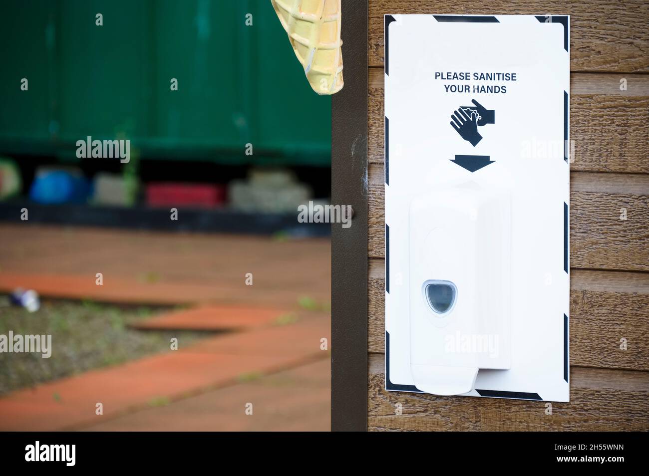 Hand sanitiser dispenser for customer use to wash hands reduce risk of ...