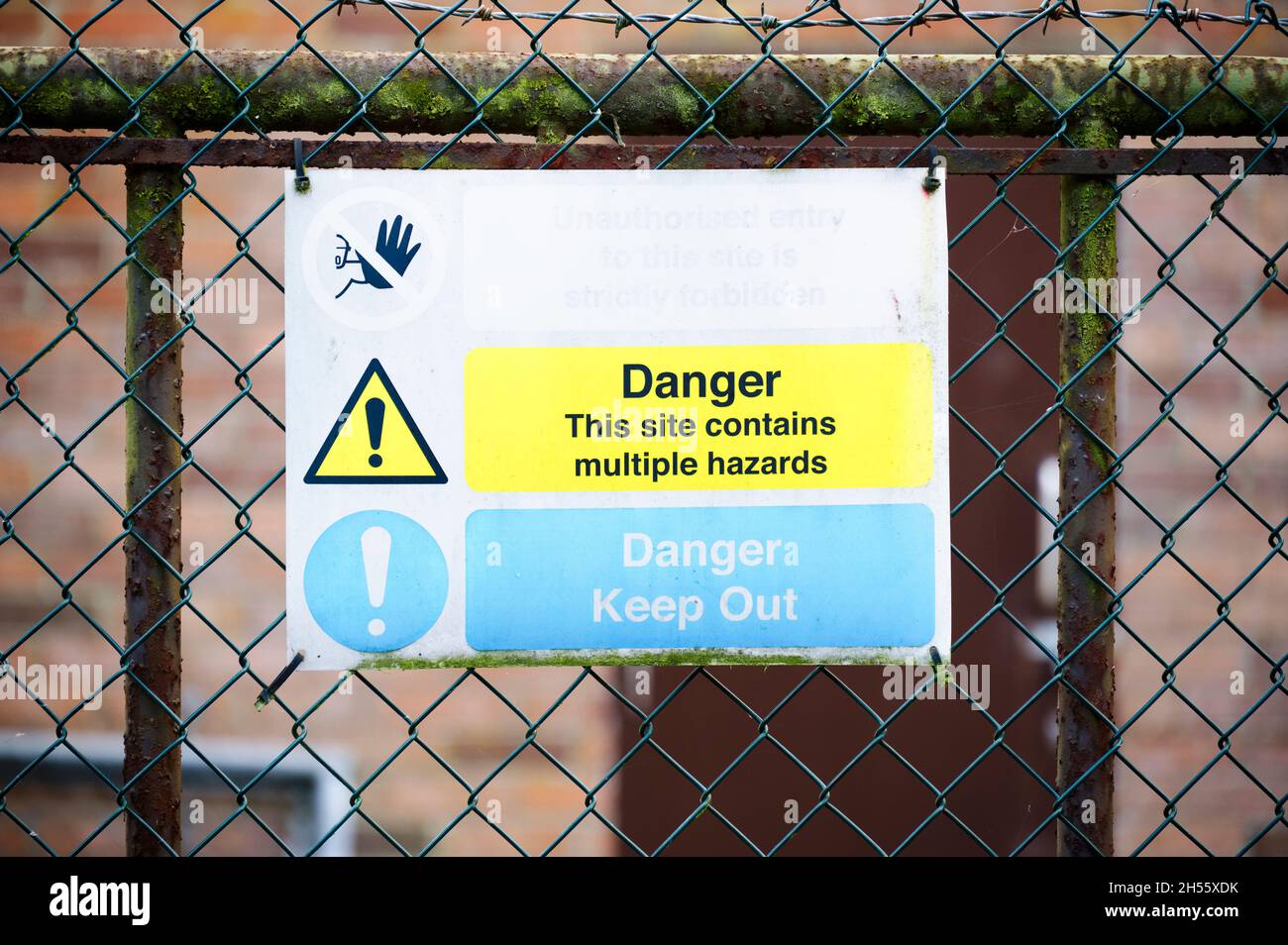 Chemical factory biohazard sign danger warning at entrance gate Stock ...