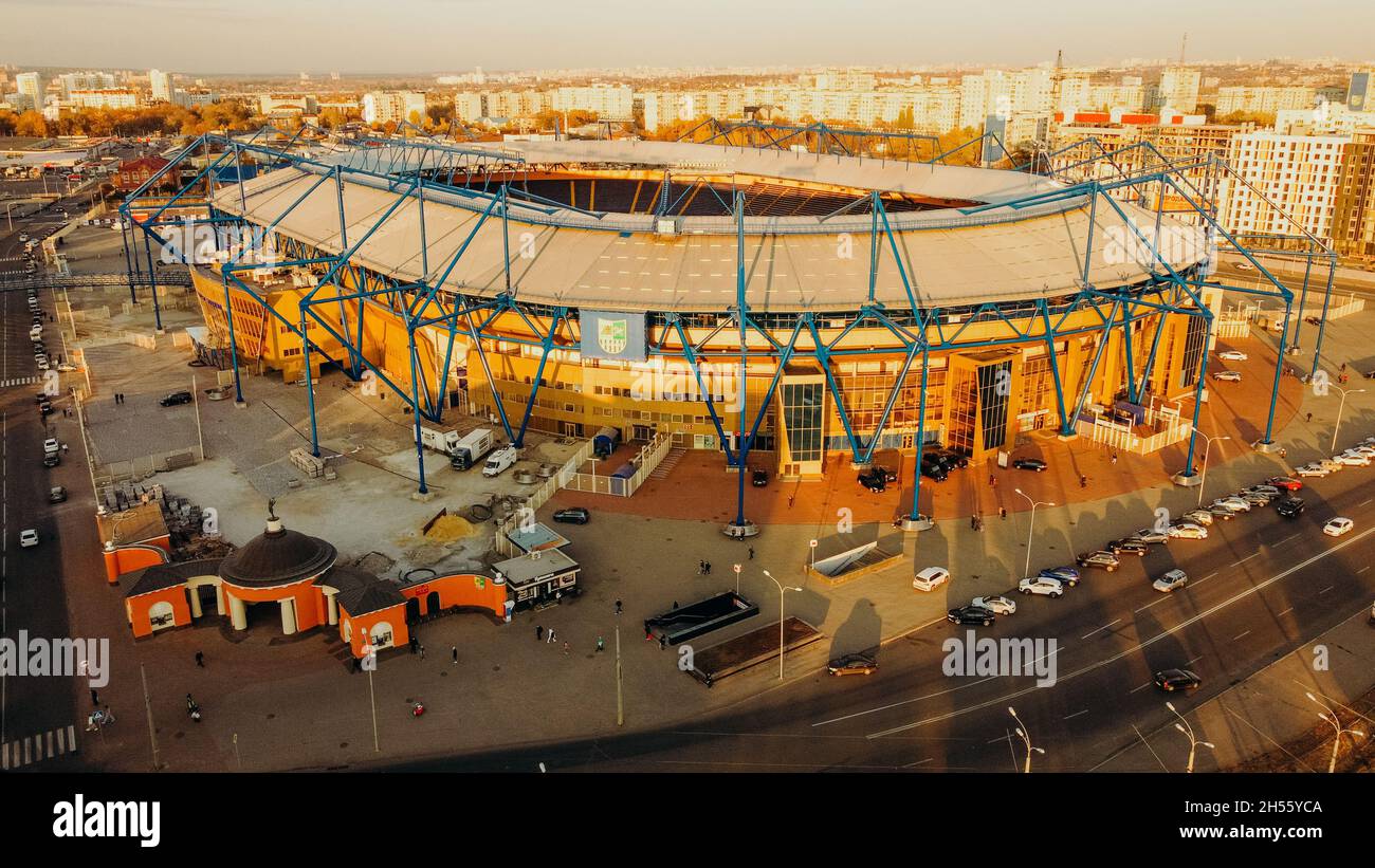 KHARKIV, UKRAINE - OCTOBER 22, 2021: Metalist stadium in sunset lights ...