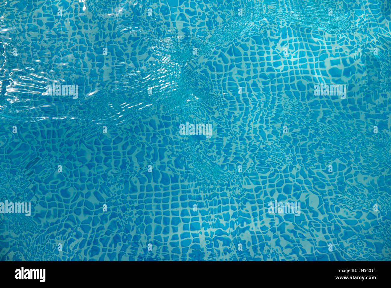 Beautiful refreshing blue swimming pool water Stock Photo - Alamy