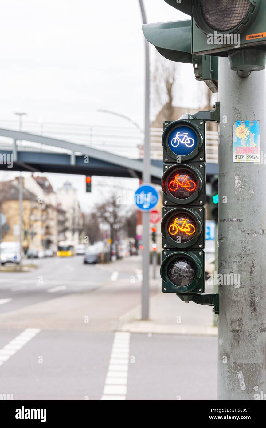 bicycle traffic light glowing red and yellow Stock Photo - Alamy